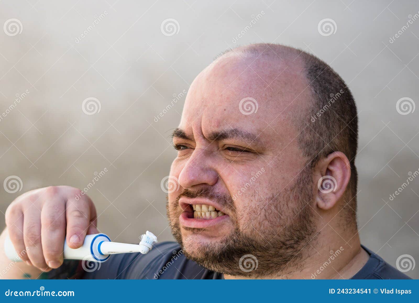 Male Brushing His Teeth with Electric Toothbrush Editorial Photo ...