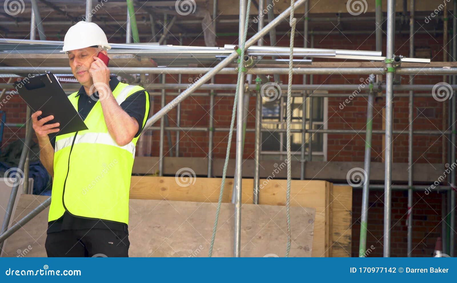 Male Builder, Construction Worker or Architect Working on Building Site ...