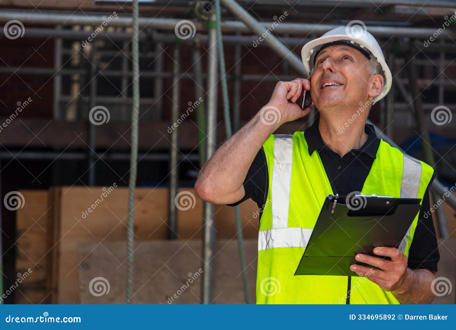 Male Builder Construction Worker on Building Site with Clipboard and ...