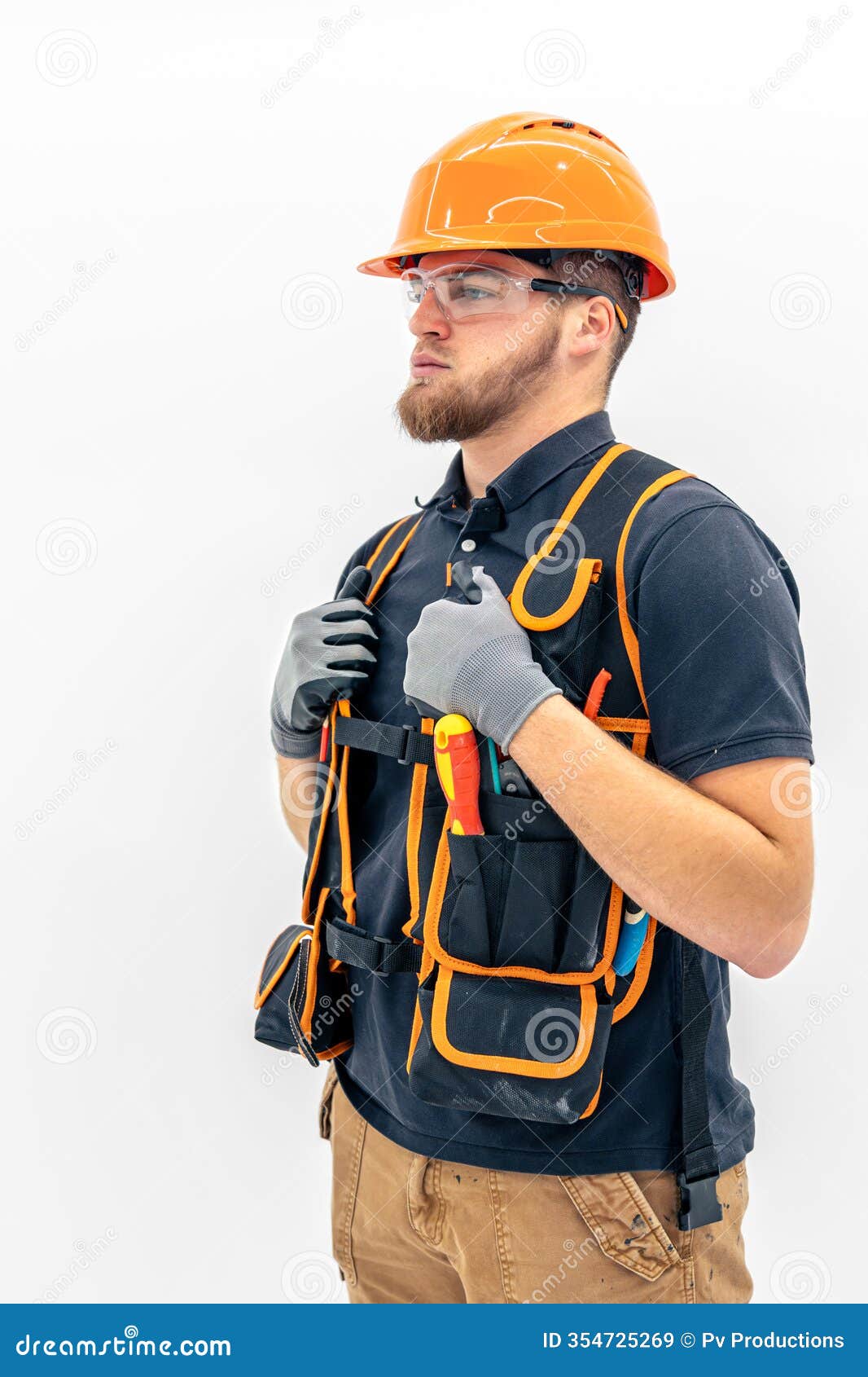 Male Builder. Electrical Engineer in Overalls and Helmet on Light ...