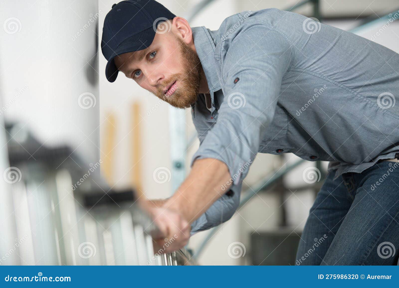 Male Builder with Folded Up Ladder Stock Photo - Image of professional ...