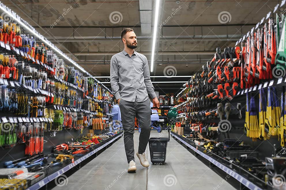 Male Builder in a Hardware Store Stock Image - Image of retail, happy ...