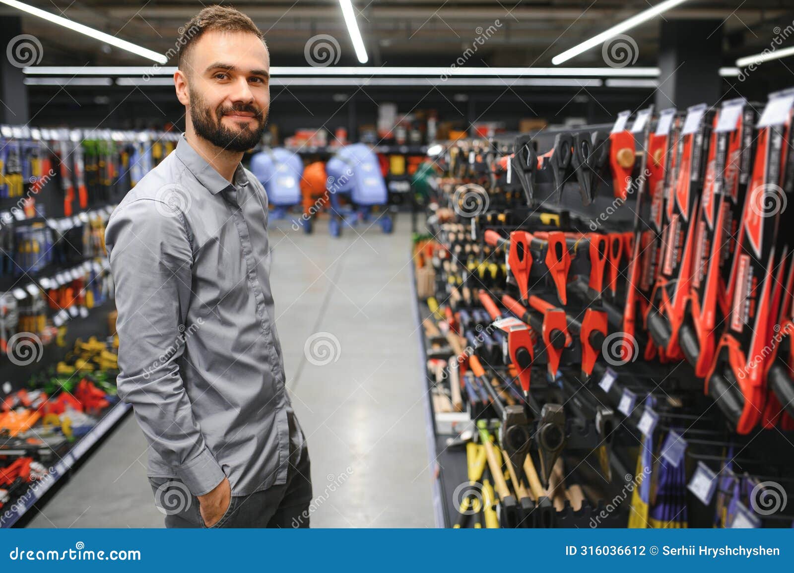 Male Builder in a Hardware Store Stock Photo - Image of choice, color ...