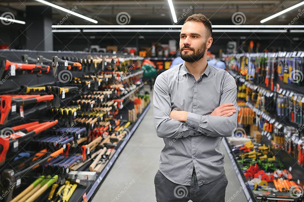 Male Builder in a Hardware Store Stock Image - Image of worker, adult ...
