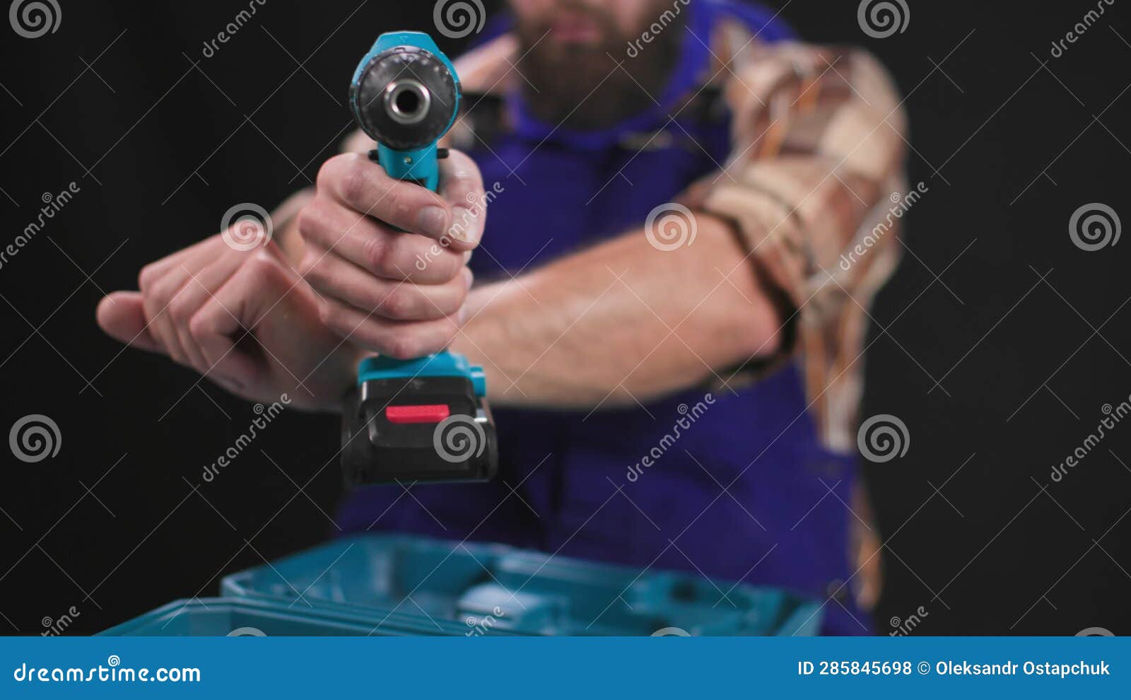 Male Builder Having Fun Playing with Construction Tool while Sitting ...