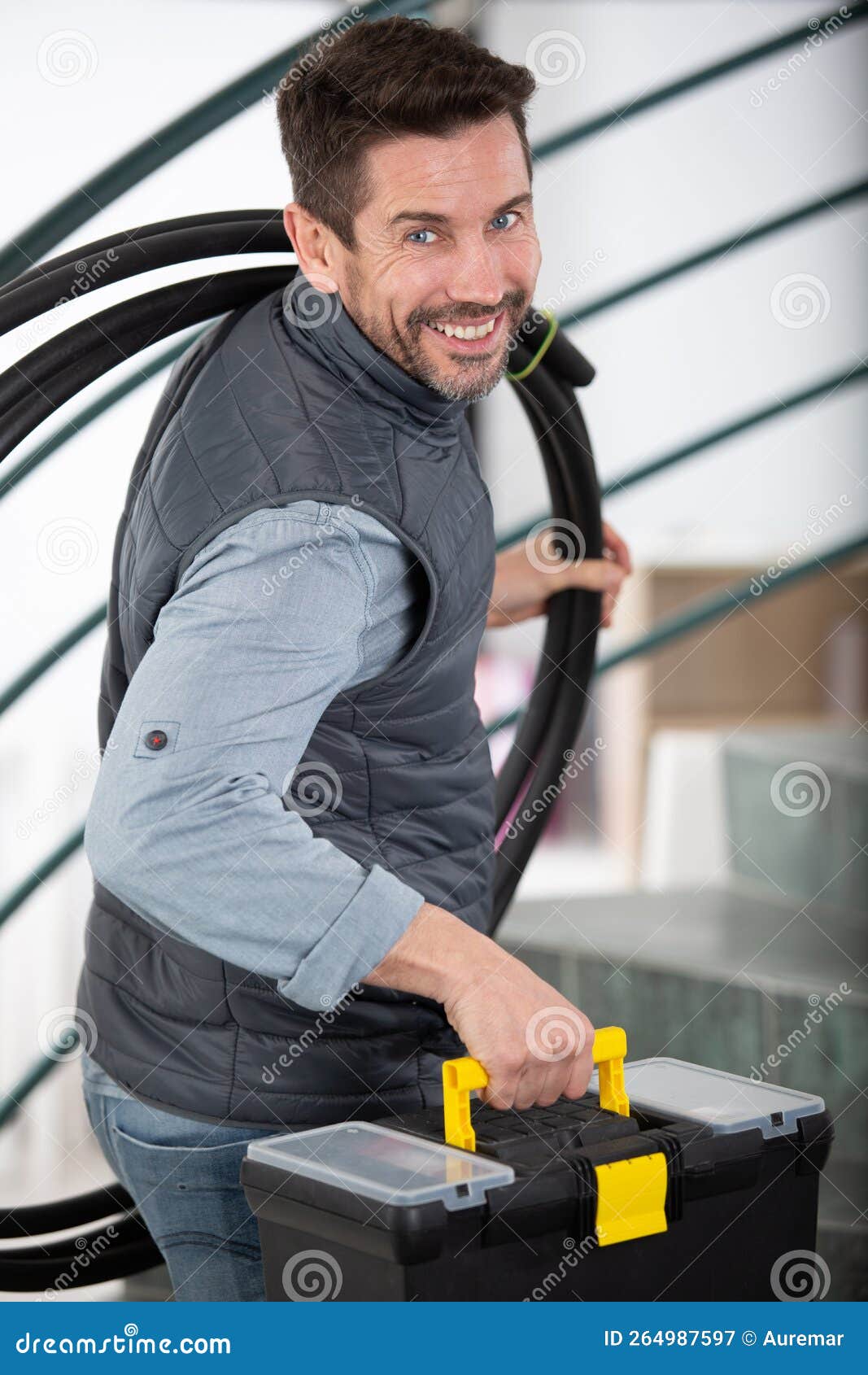 Male Builder Holding Hose Pipe Insulation Stock Image - Image of radio ...