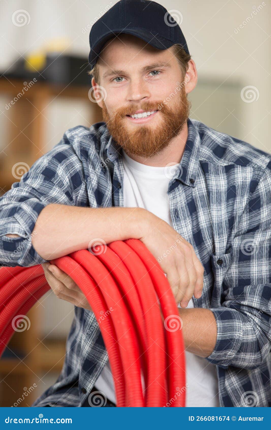 Male Builder Holding Hose Pipe Insulation Stock Photo - Image of male ...