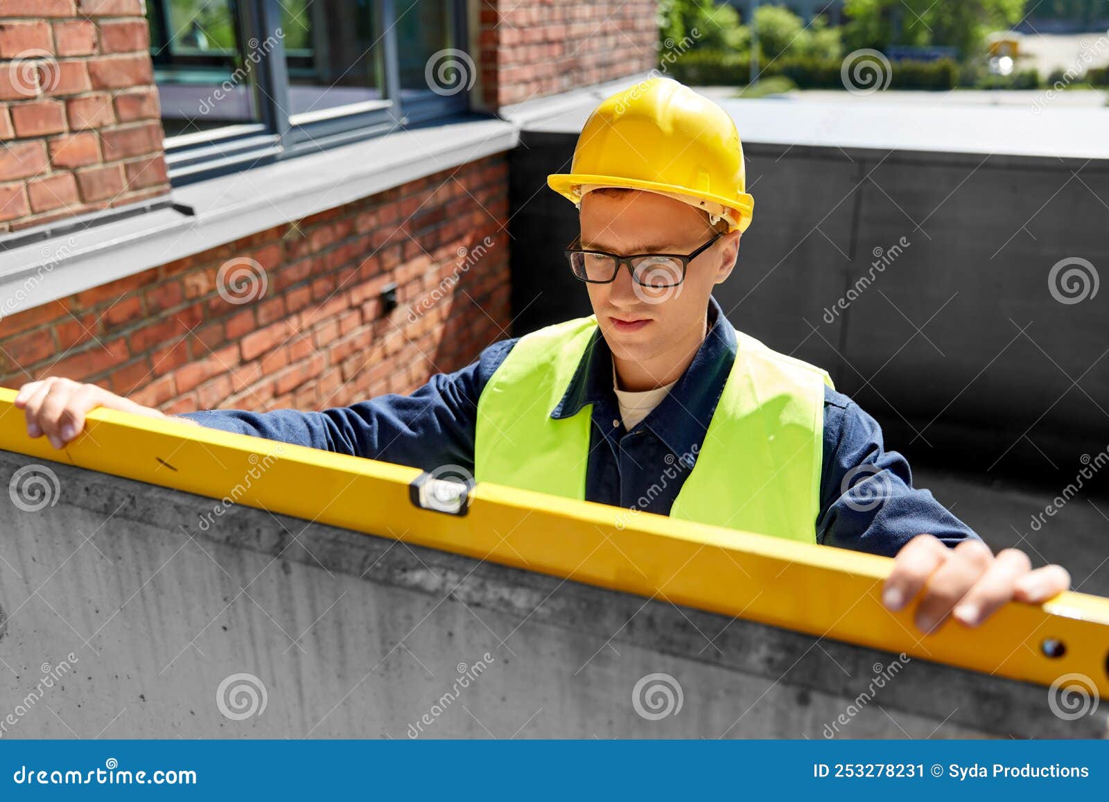Male Builder with Level Measuring Wall Stock Image - Image of people ...