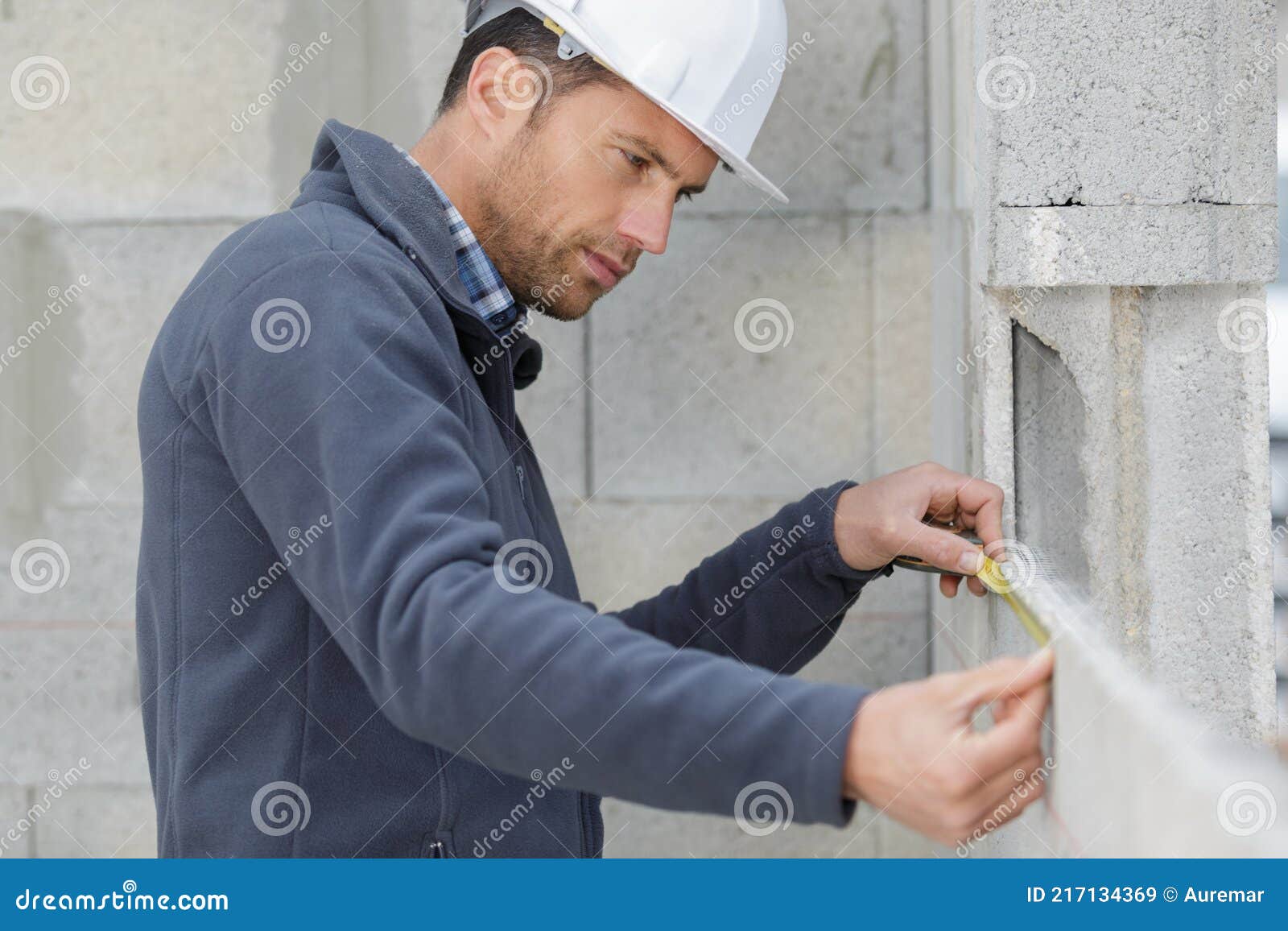 Builder Measures Wall Stock Image | CartoonDealer.com #188227939