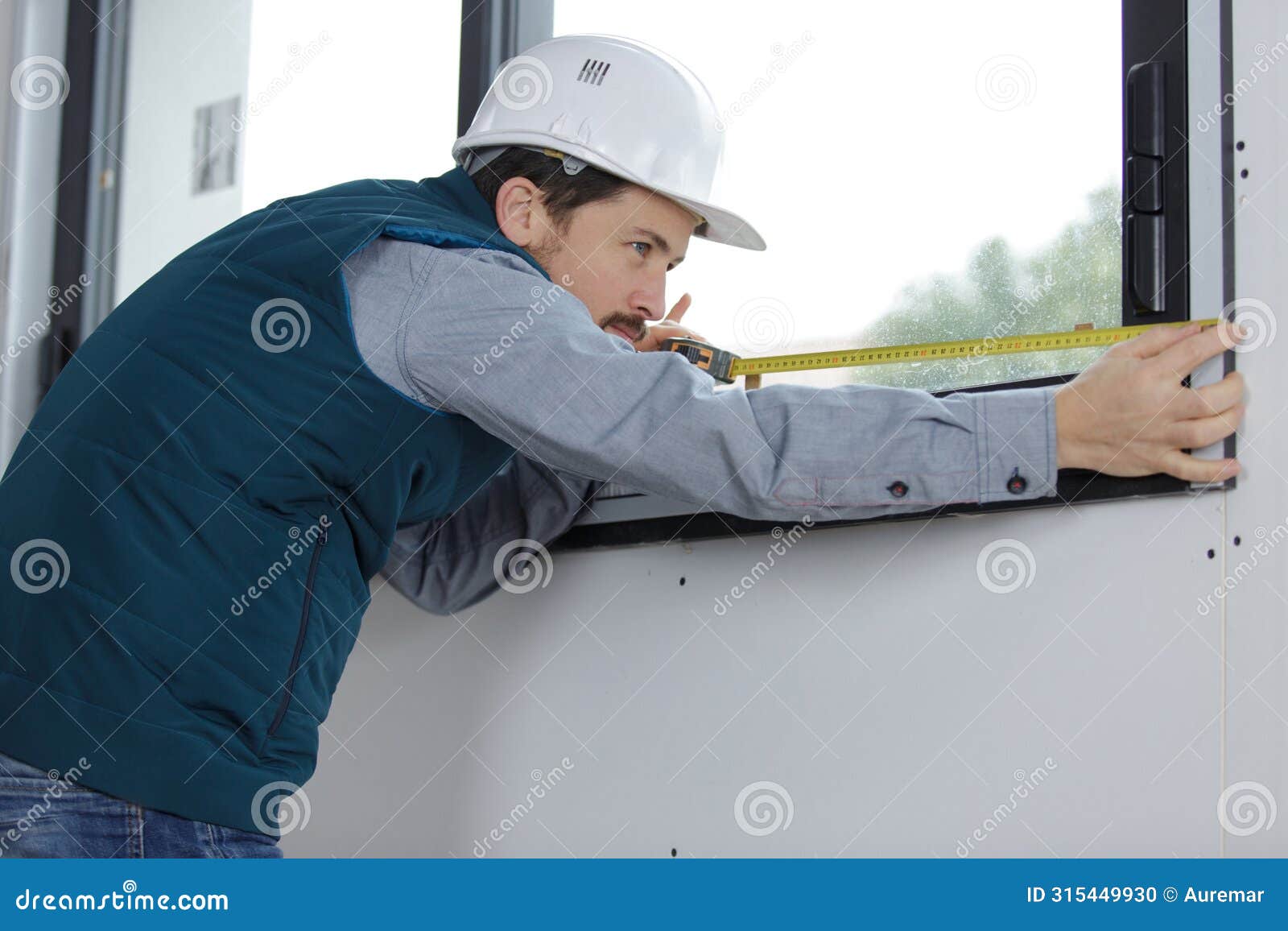 Male Builder Measuring Window Stock Photo - Image of hanging, person ...