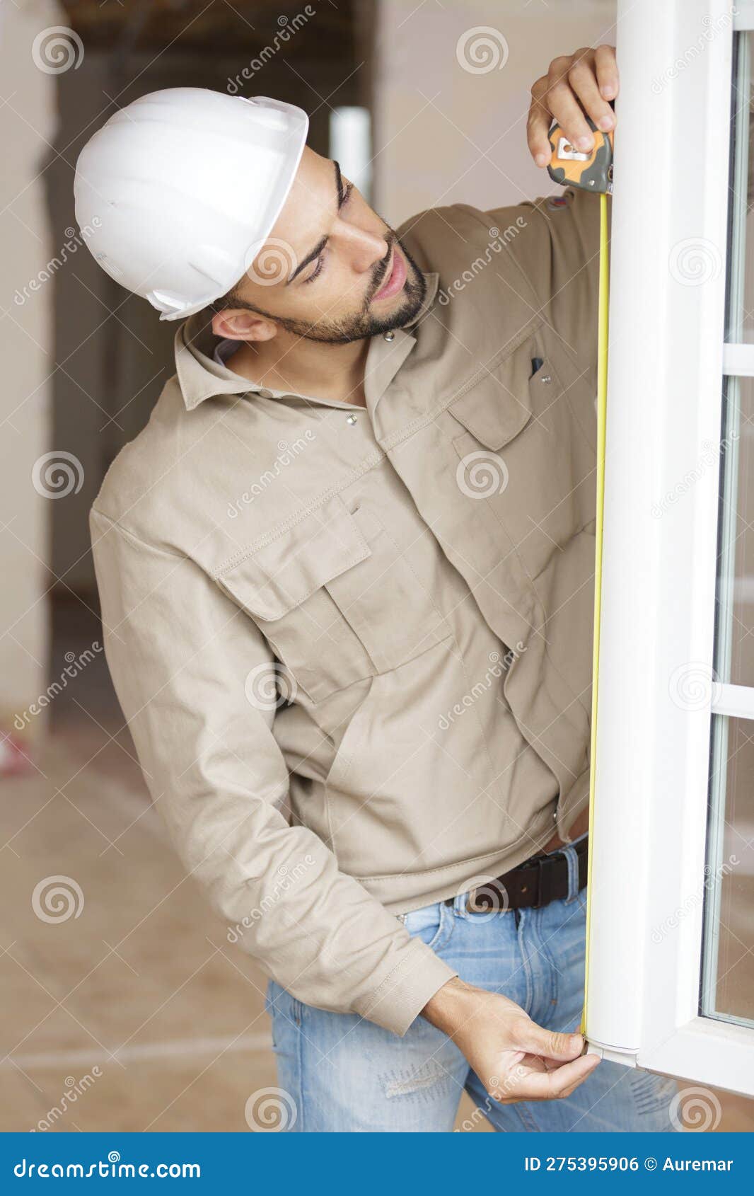 Male Builder Measuring Window Stock Photo - Image of shutter, hurricane ...