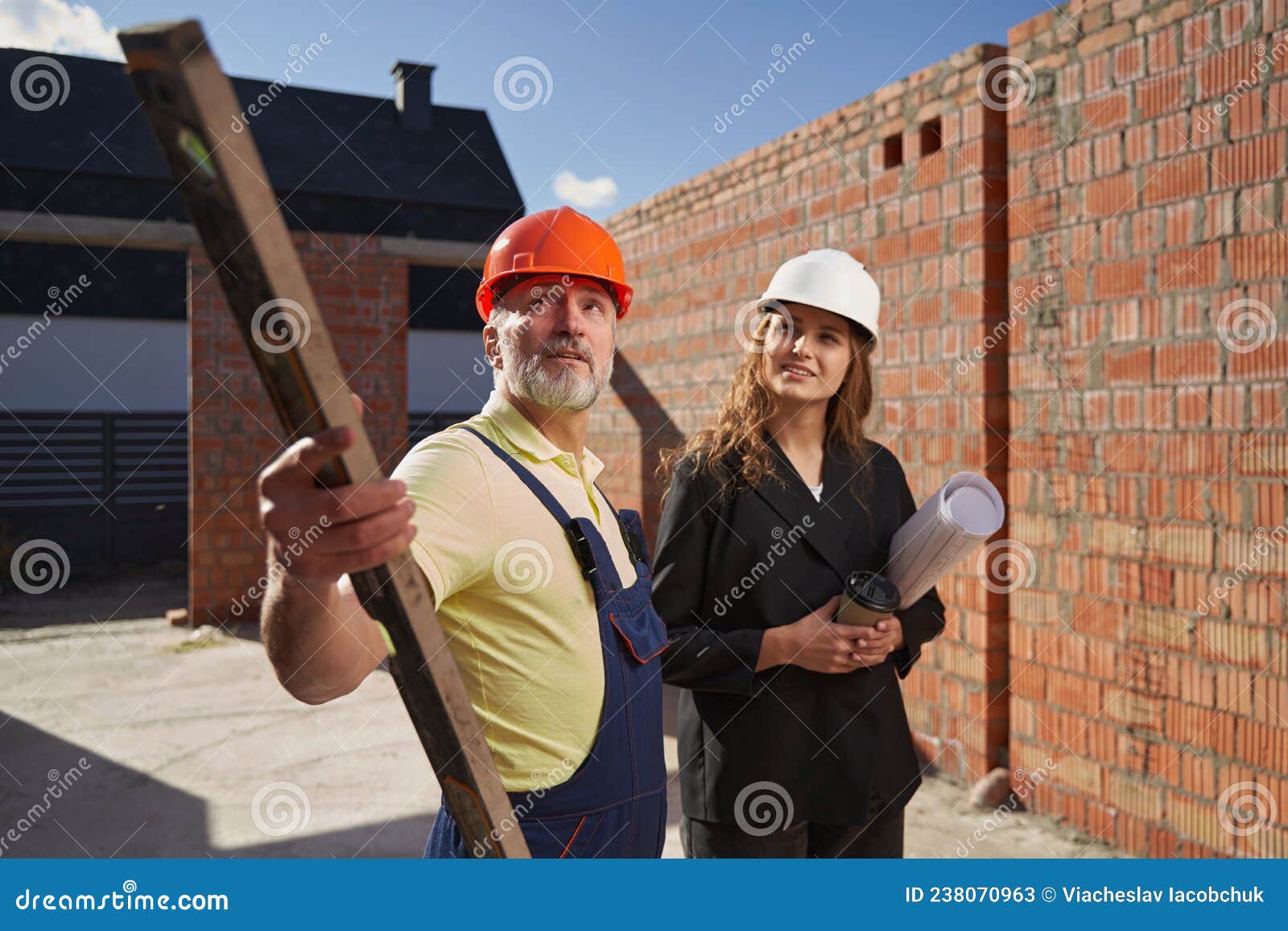 Male Builder with Pointing with Bubble Level Stock Image - Image of ...