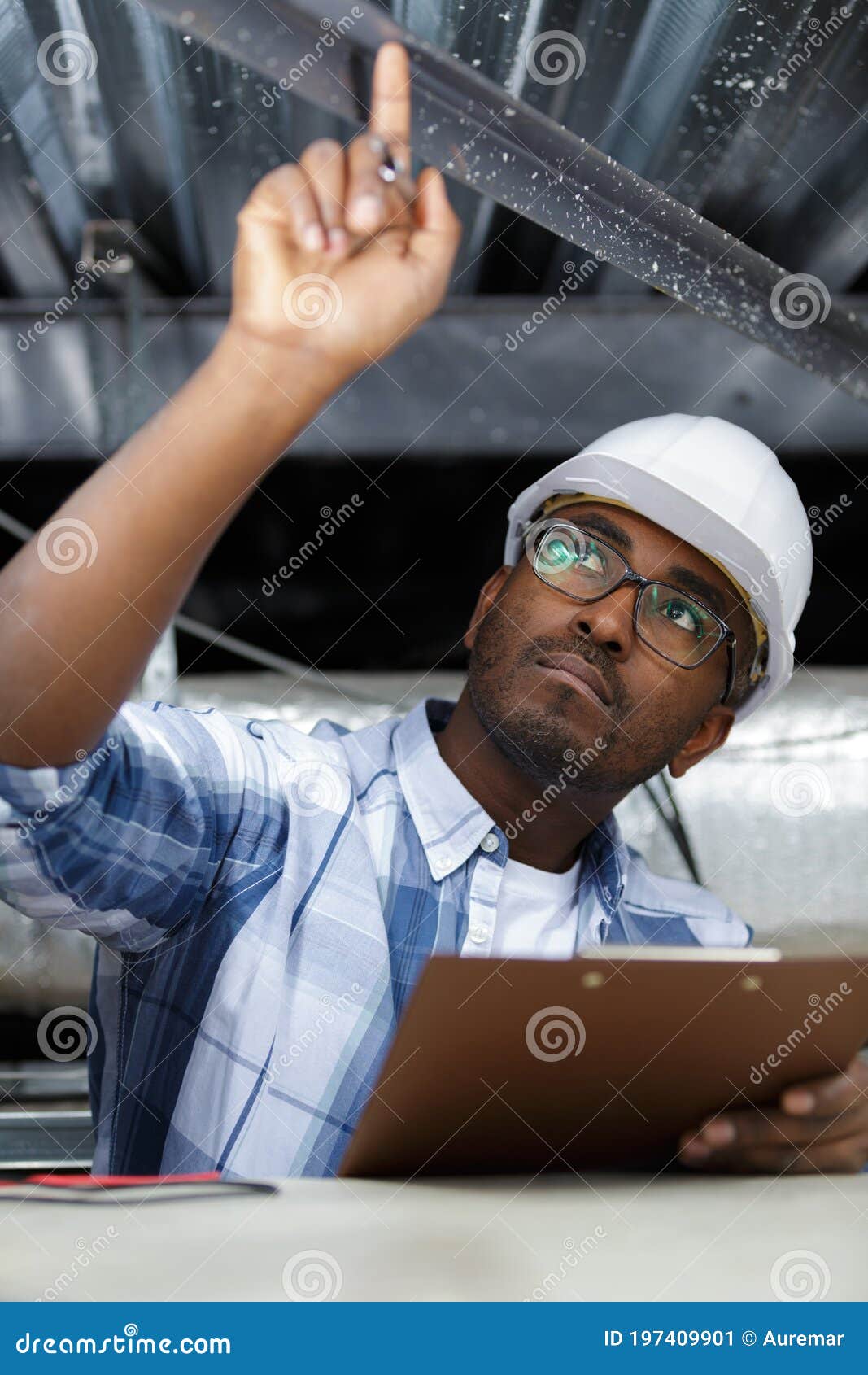 Male Builder Pointing at Ceiling Stock Image - Image of oneperson ...