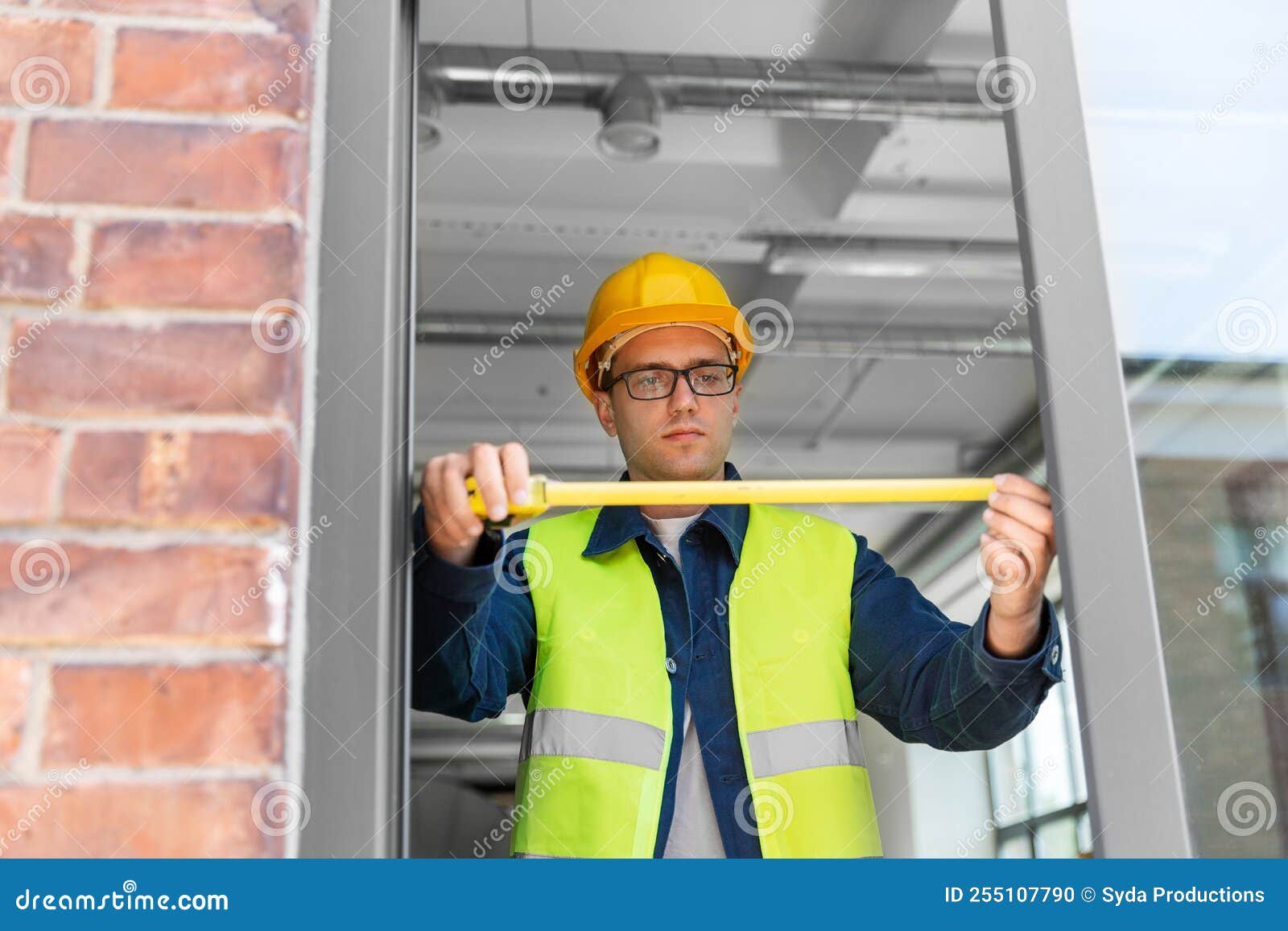Male Builder with Ruler Measuring Window Stock Photo - Image of helmet ...