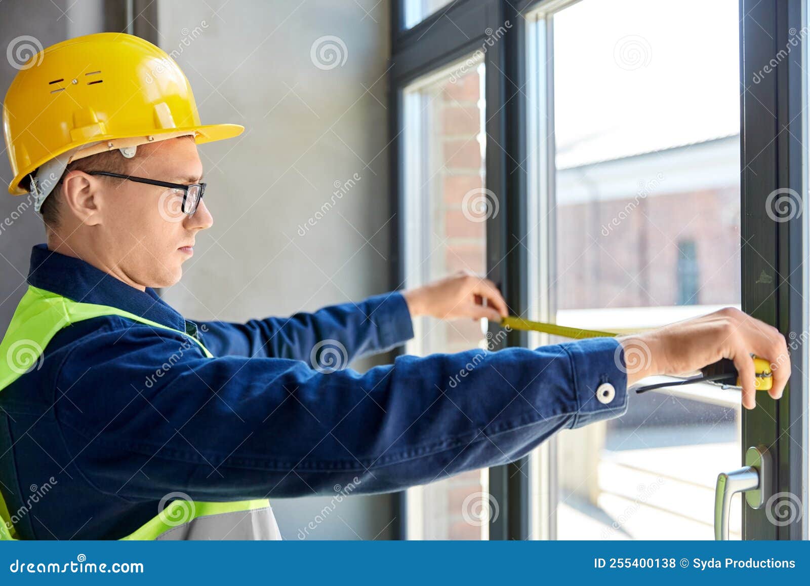Male Builder with Ruler Measuring Window Stock Photo - Image of concept ...