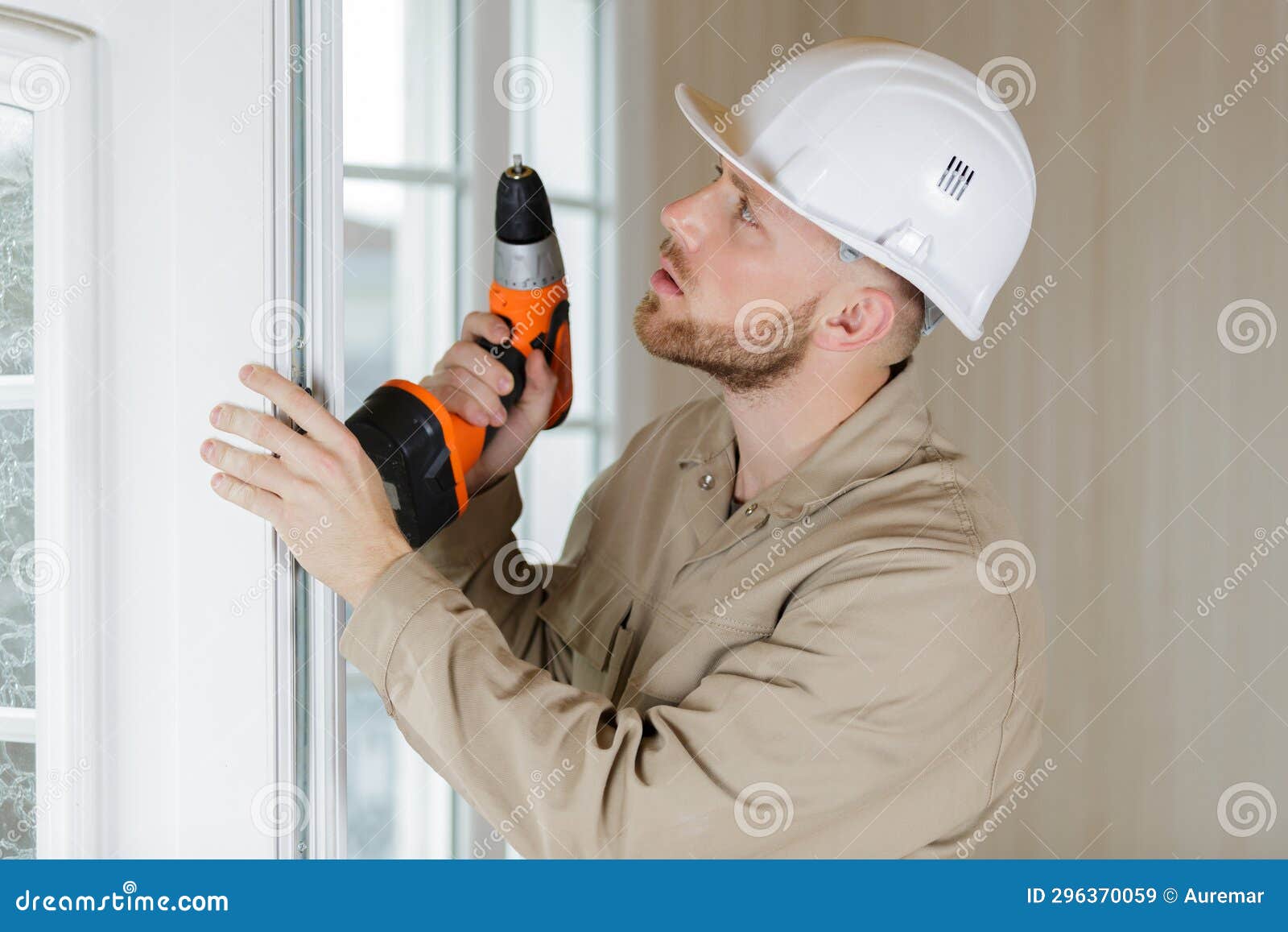 Male Builder Using Cordless Drill Stock Image - Image of handyman ...