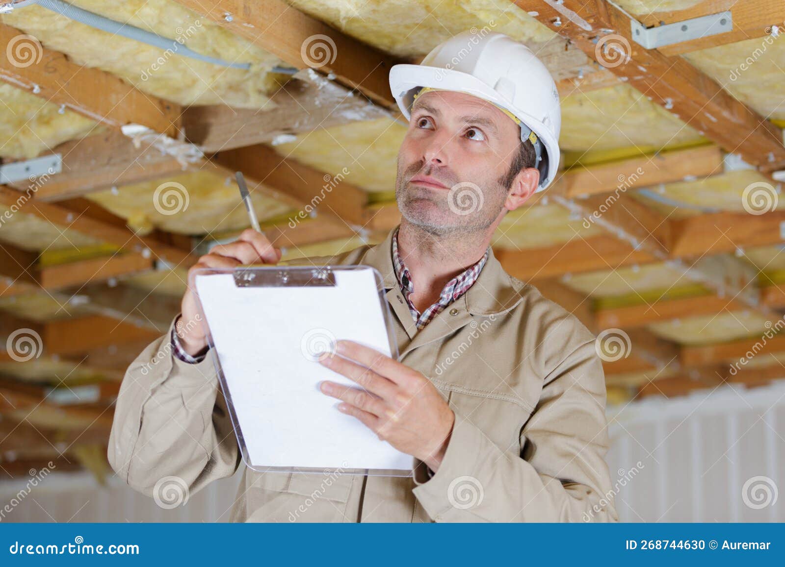 Male Building Inspector Assessing Renovation Project Stock Photo ...