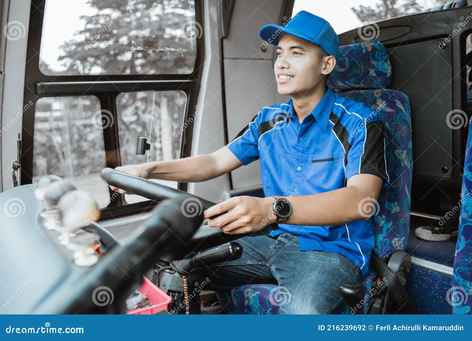 A Male Bus Driver is Driving the Bus Stock Photo - Image of service ...