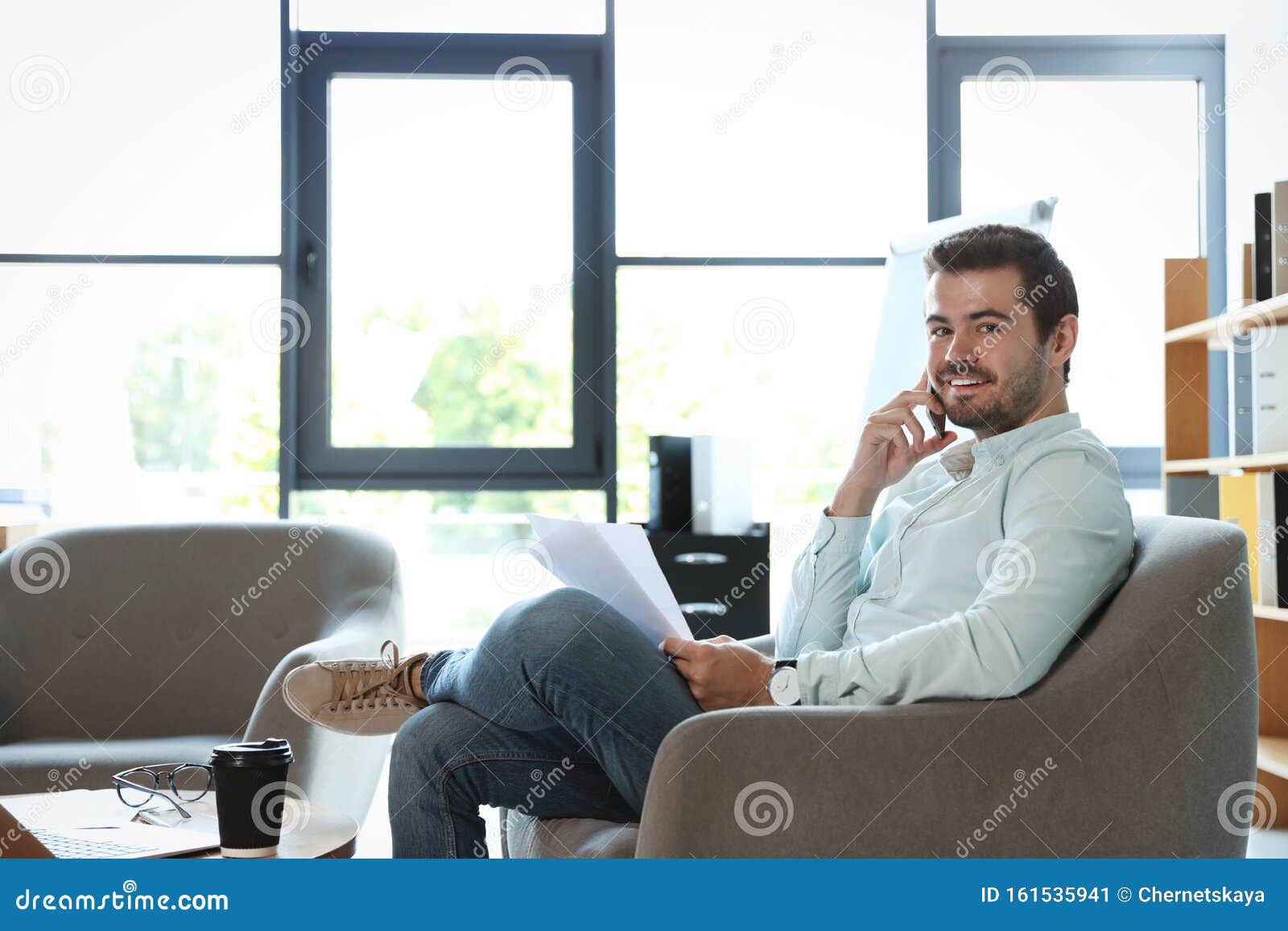 Male Business Trainer Working with Documents Stock Image - Image of ...