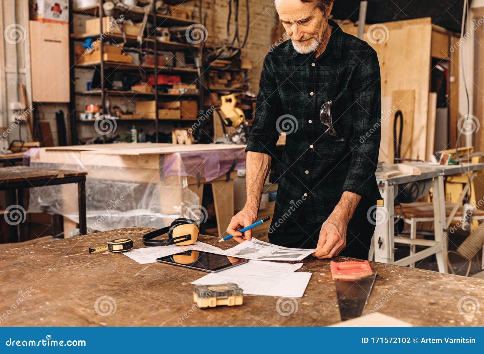 Male Carpenter Standing at Workbench Stock Photo - Image of male ...