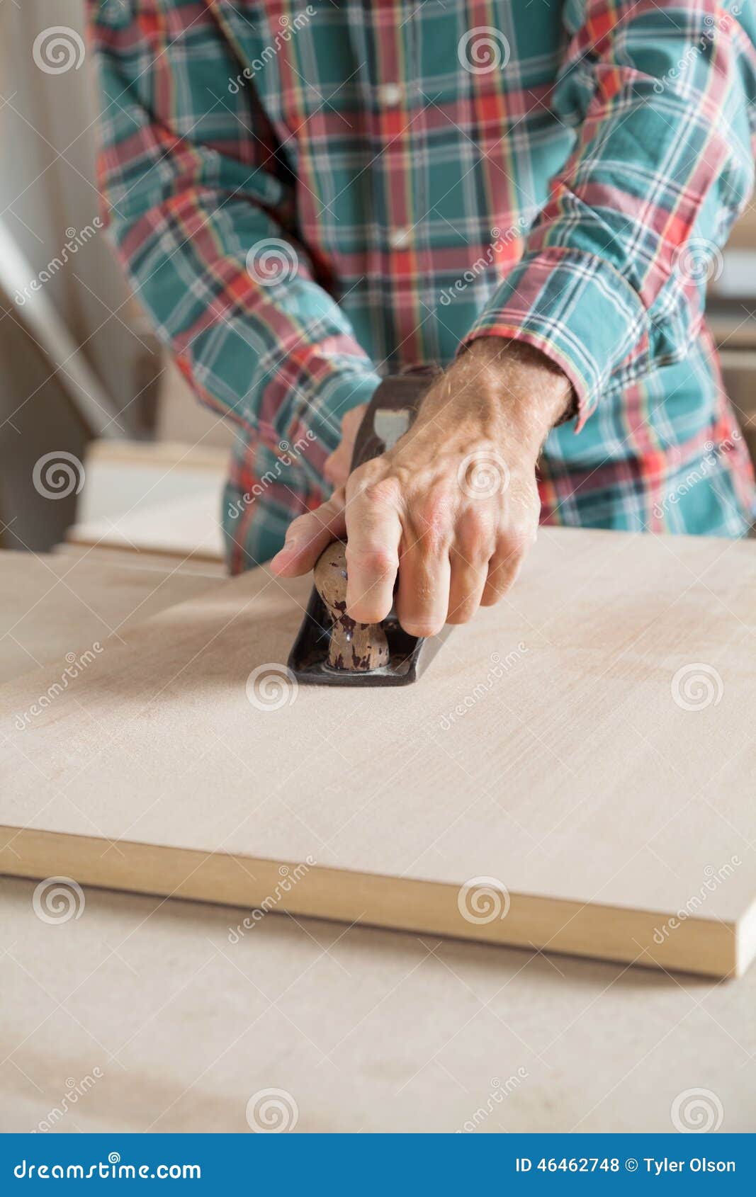 Male Carpenter Using Planer on Wooden Plank Stock Photo - Image of ...