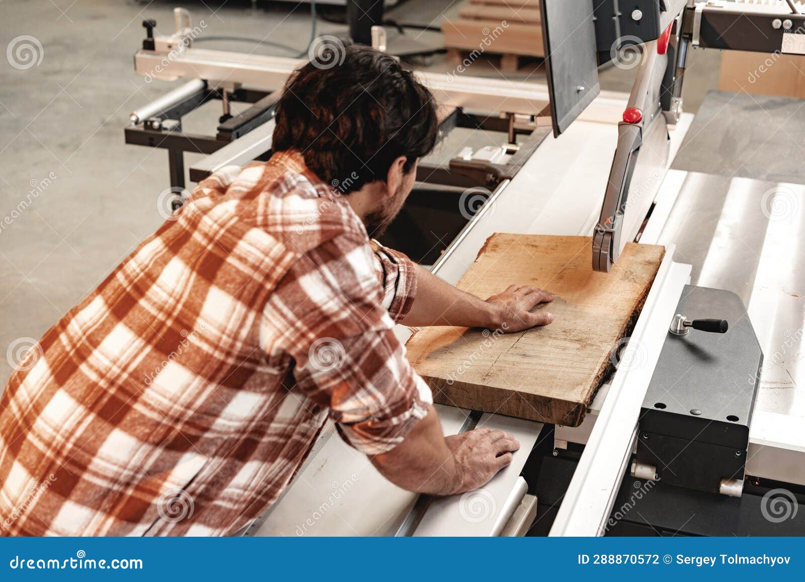 Male Carpenter Using Some Woodworking Tools for His Work in a Factory ...
