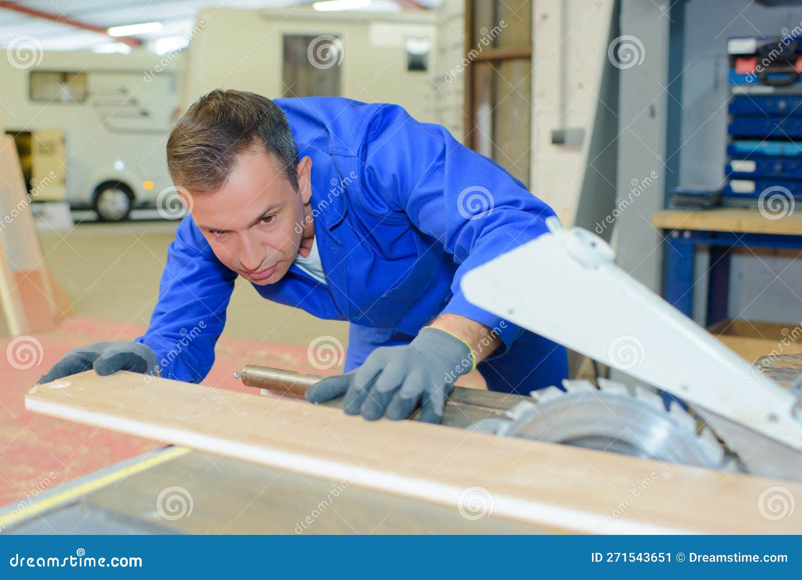 Male Carpenter Using Table Saw Stock Image - Image of base, gloves ...