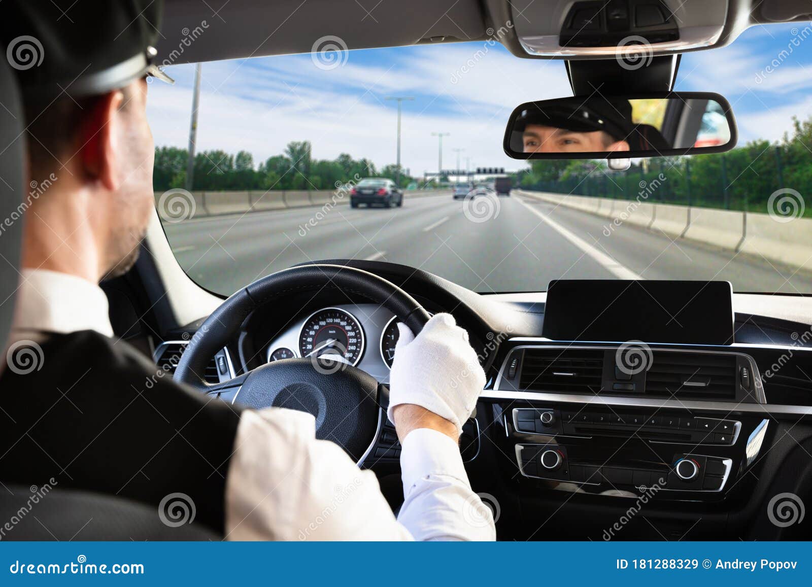 Male chauffeur driving car stock image. Image of forward - 181288329