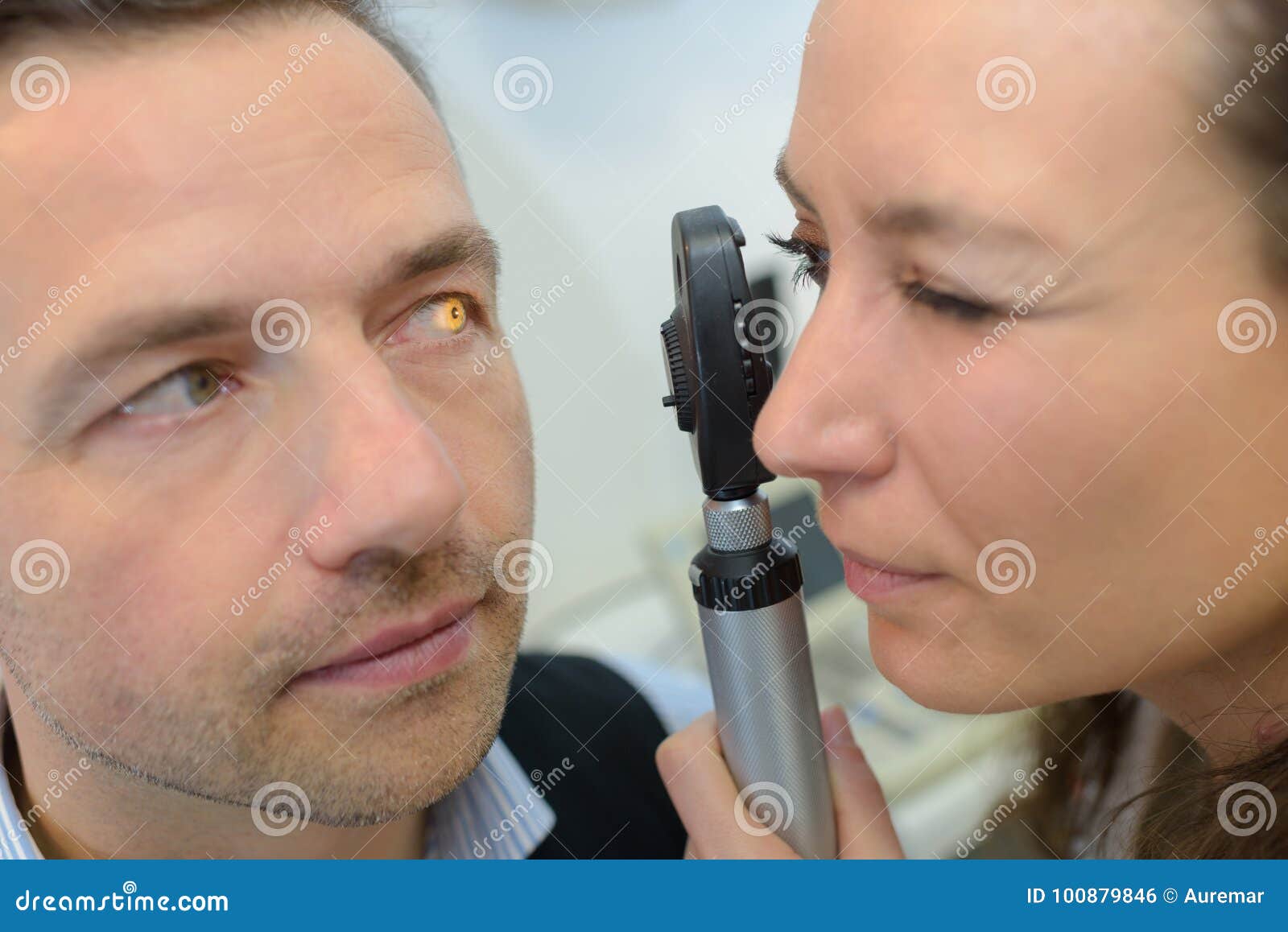 Male Checks Eyes on Modern Equipment Stock Photo - Image of health ...