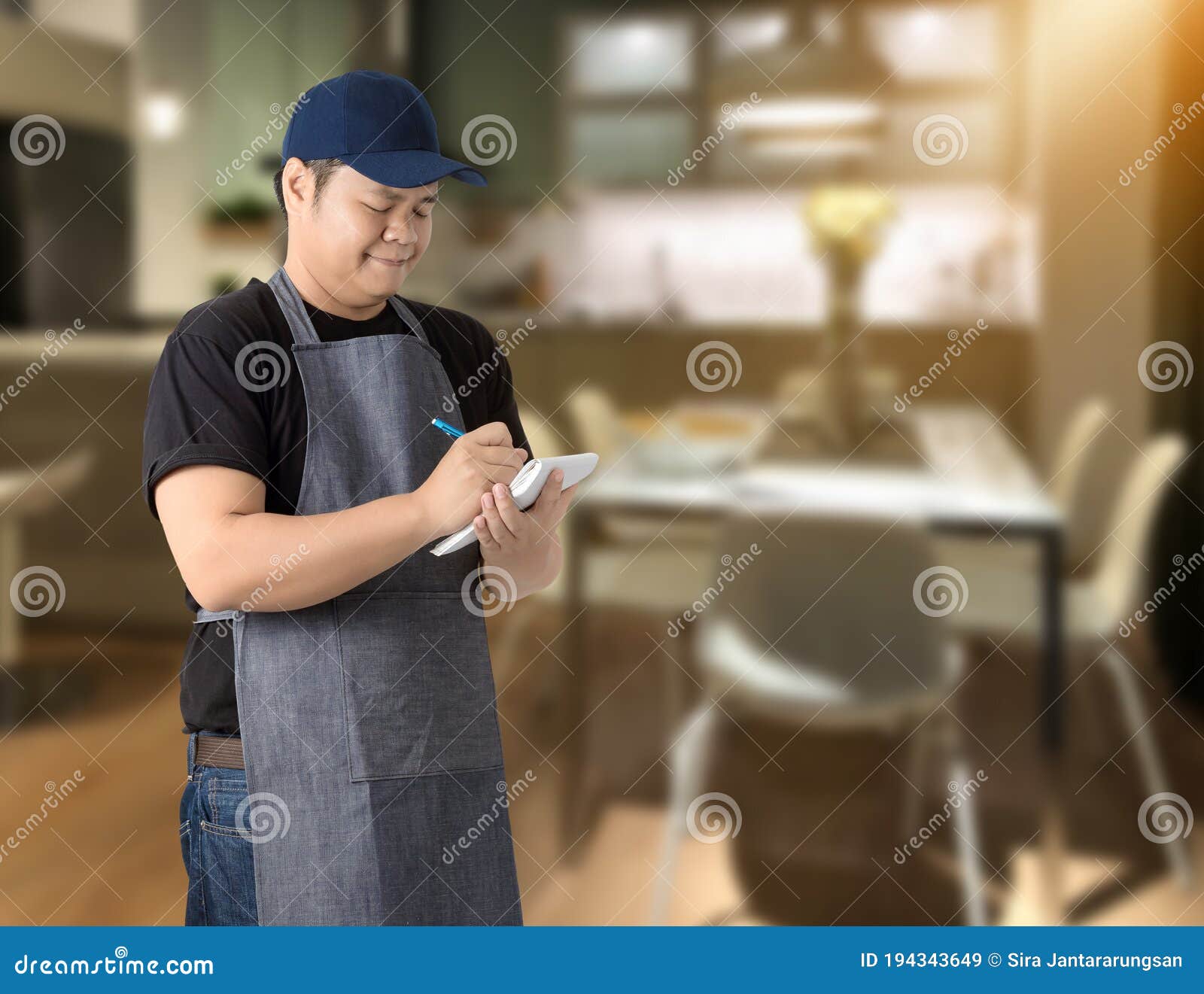 Male Chef Assistant Taking Order and Making Note Stock Image - Image of ...