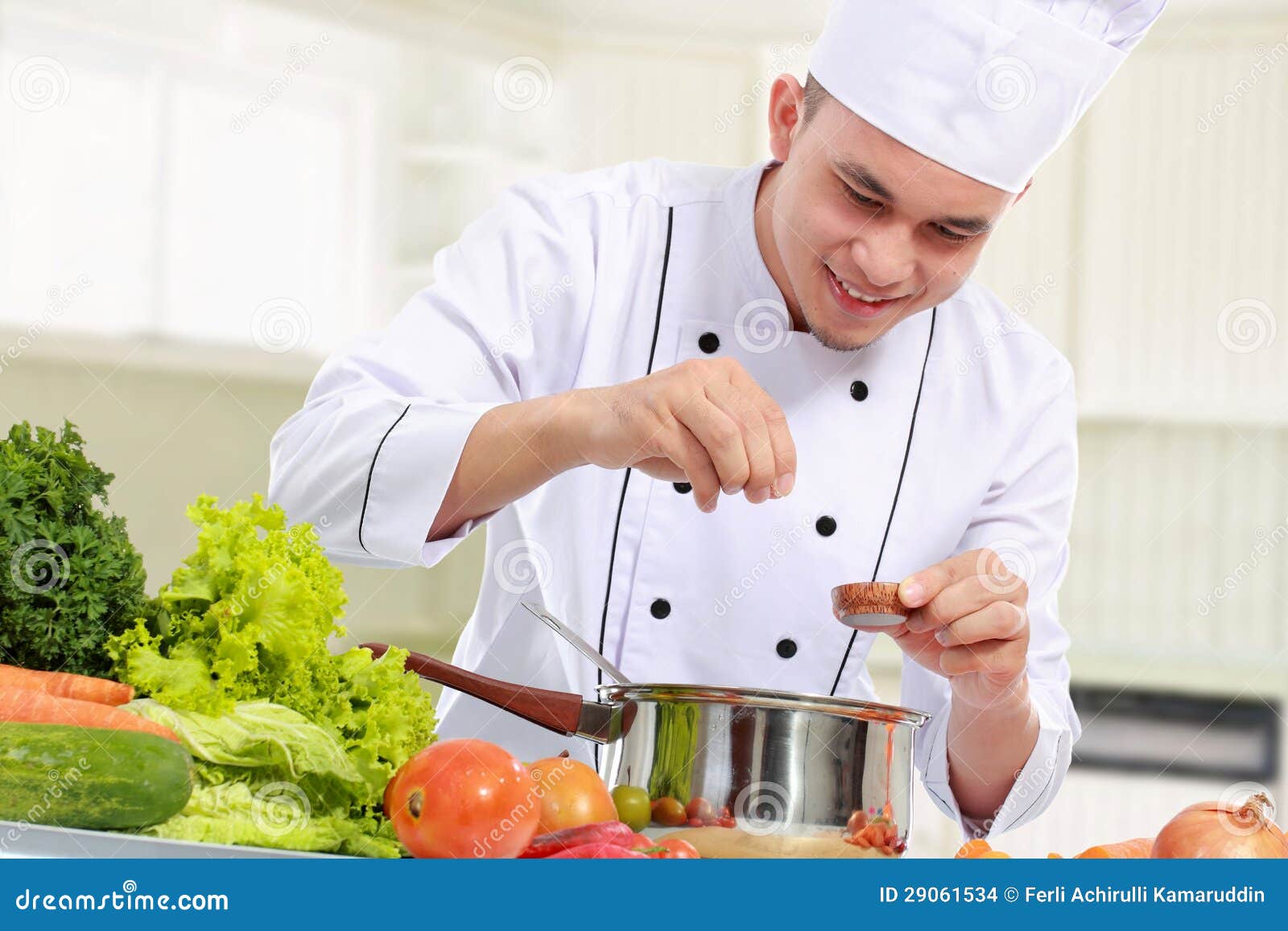 Male chef while cooking stock photo. Image of pepper - 29061534