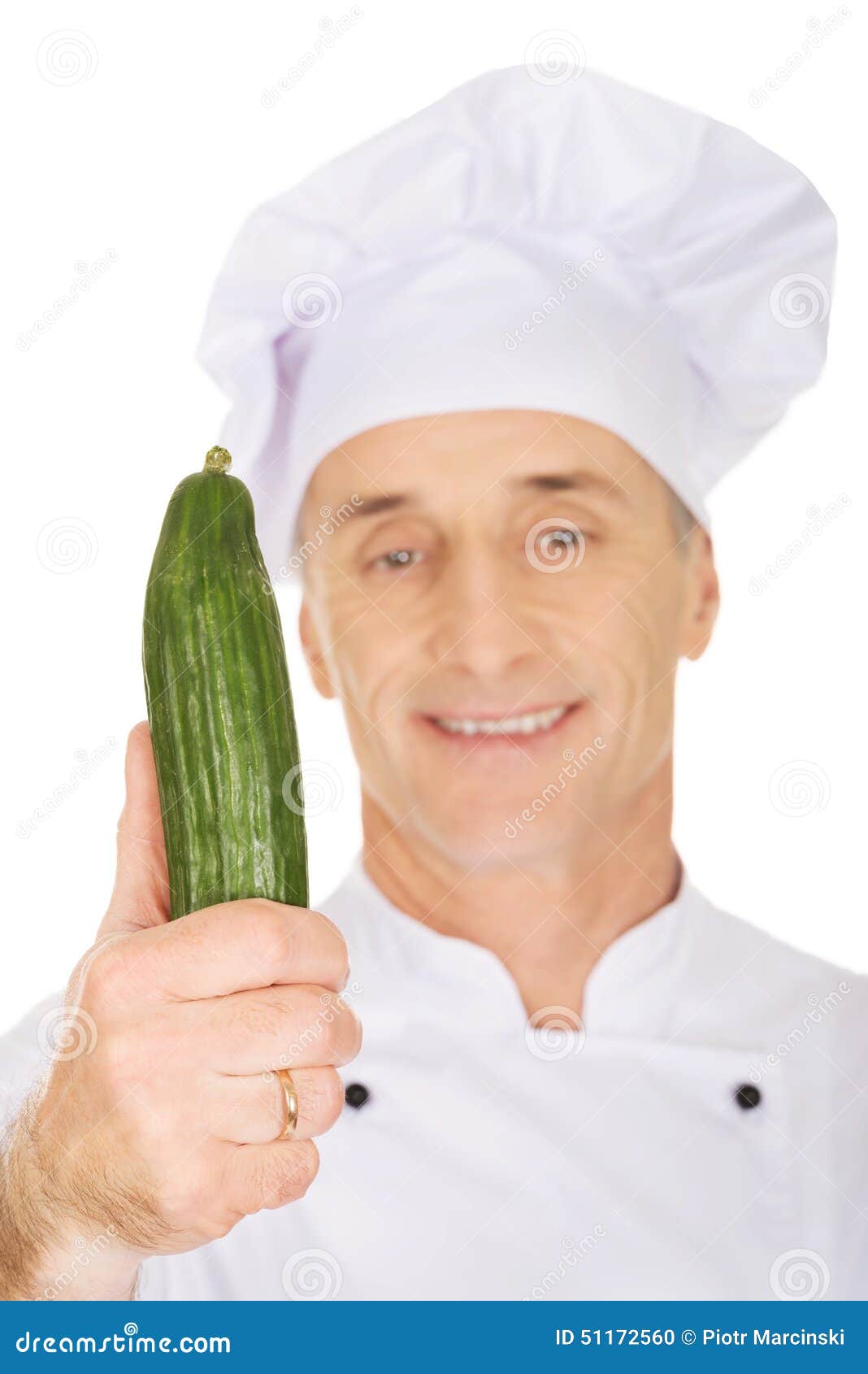 Male chef with a cucumber stock photo. Image of culinary - 51172560
