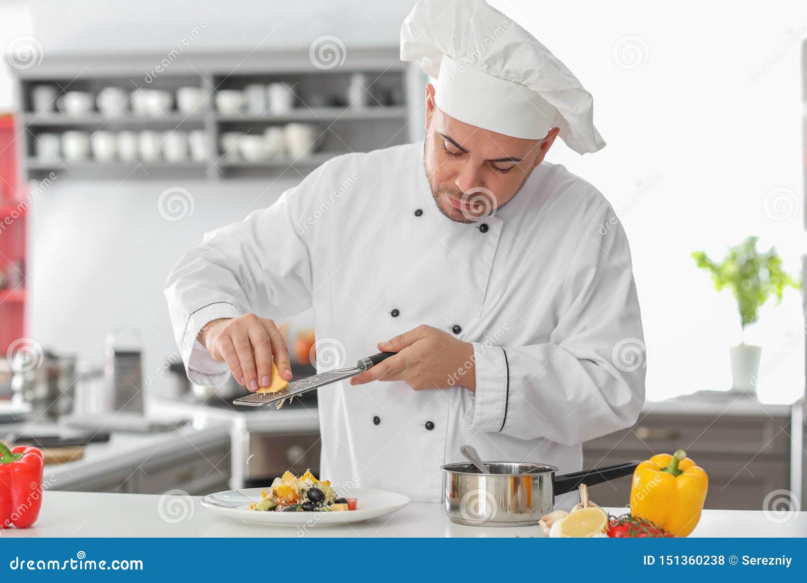 Male Chef Making Tasty Salad in Kitchen Stock Photo - Image of ...