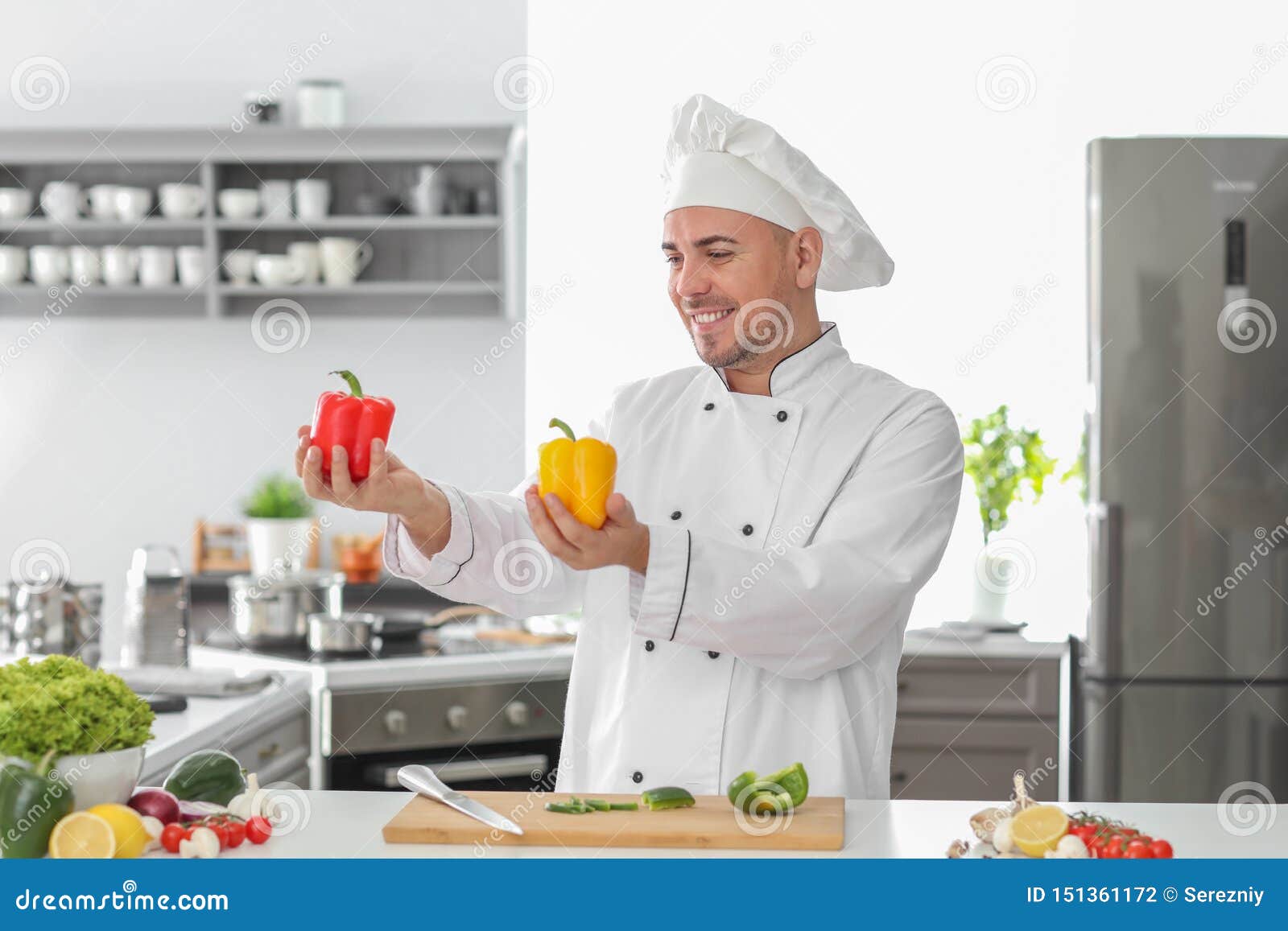 Male Chef with Peppers in Kitchen Stock Photo - Image of caucasian ...
