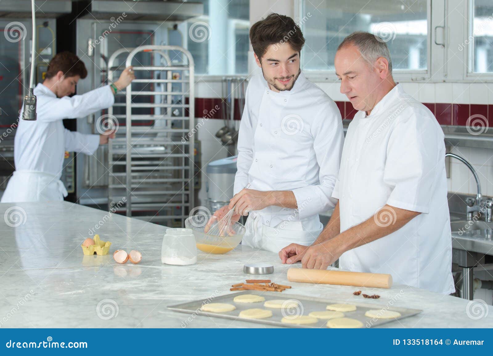 Male chef preparing cake stock photo. Image of making - 133518164