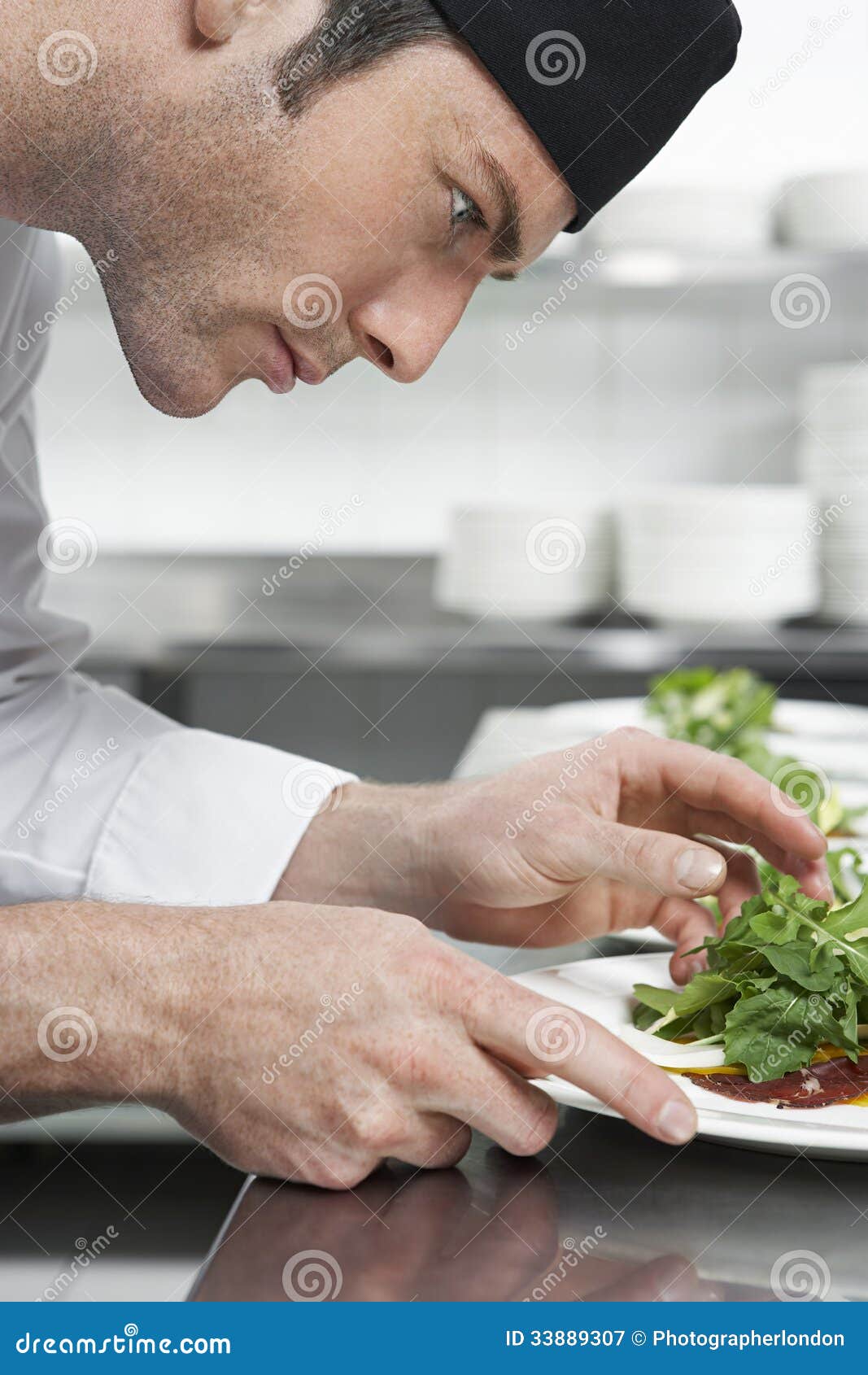 Male Chef Preparing Salad in Kitchen Stock Image - Image of focus ...