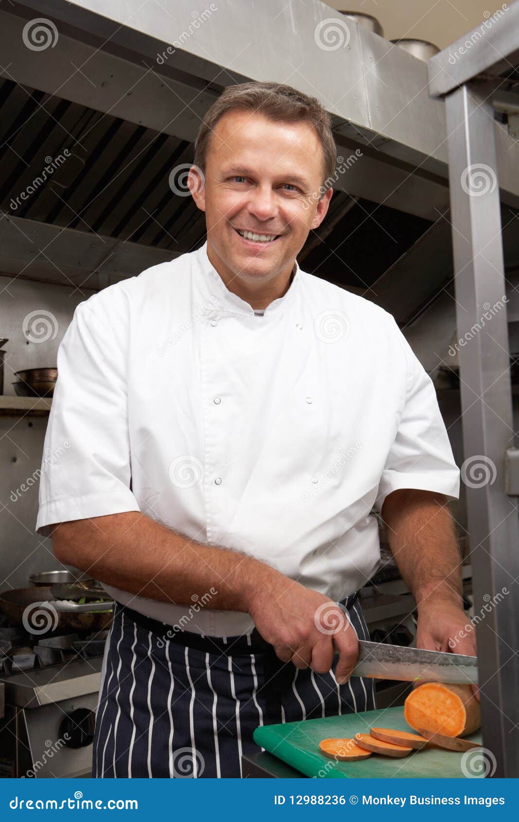Male Chef Cook Reading Recipe Book While Preparing Food Royalty-Free ...