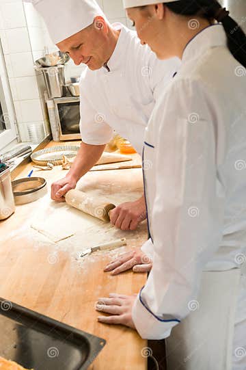 Male Chef Rolling Dough with Rolling Pin Stock Image - Image of ...