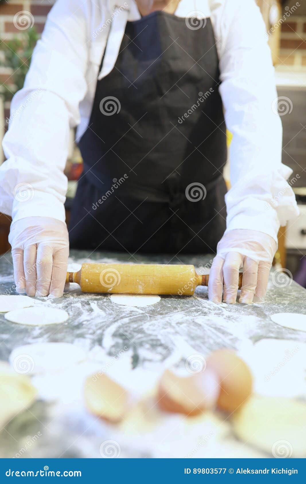 Male Chef Uses Ingredients for Preparing Flour Products on Kitch Stock ...