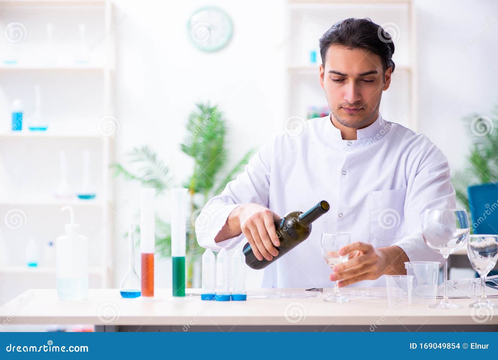 Male Chemist Examining Wine Samples at Lab Stock Photo - Image of ...