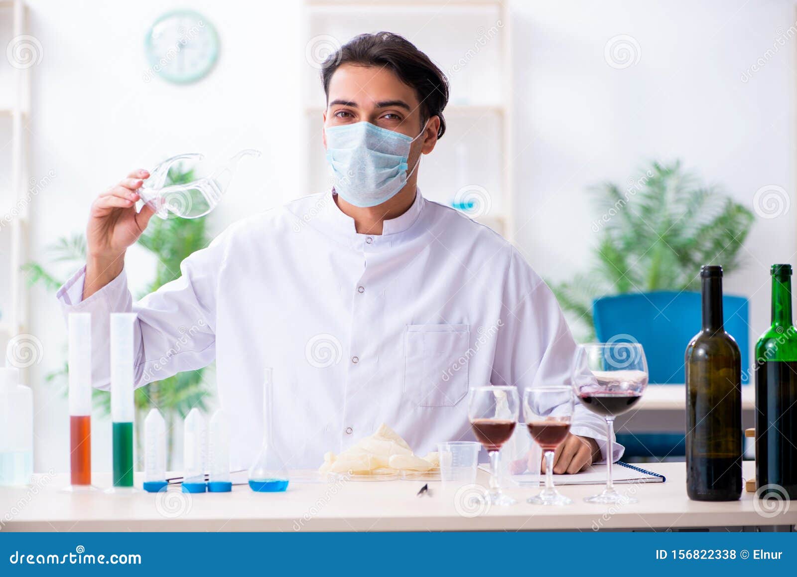 Male Chemist Examining Wine Samples at Lab Stock Photo - Image of ...
