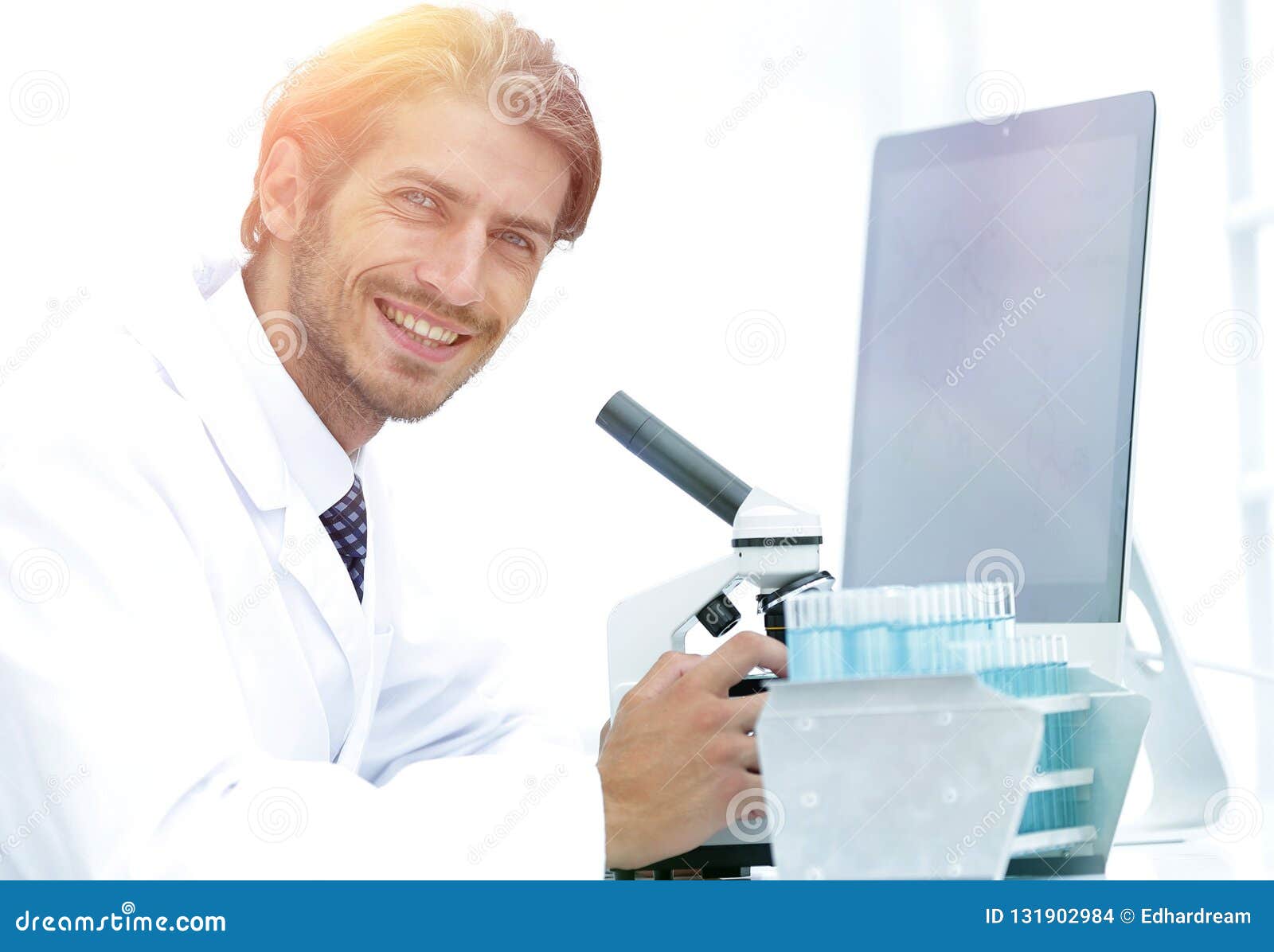 Male Chemist Scientific Reseacher Using Microscope in Laboratory Stock ...