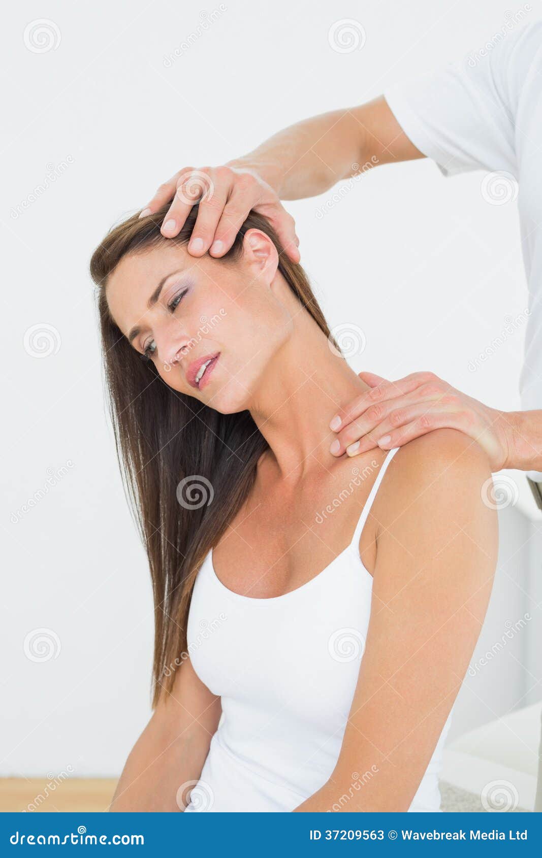 Male Chiropractor Doing Neck Adjustment Stock Image - Image of healing ...
