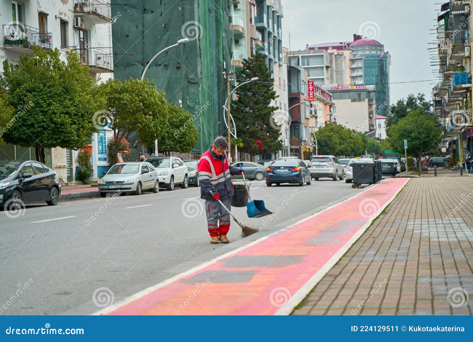 Male City Janitor, Sweeping the Streets of the City Editorial Photo ...