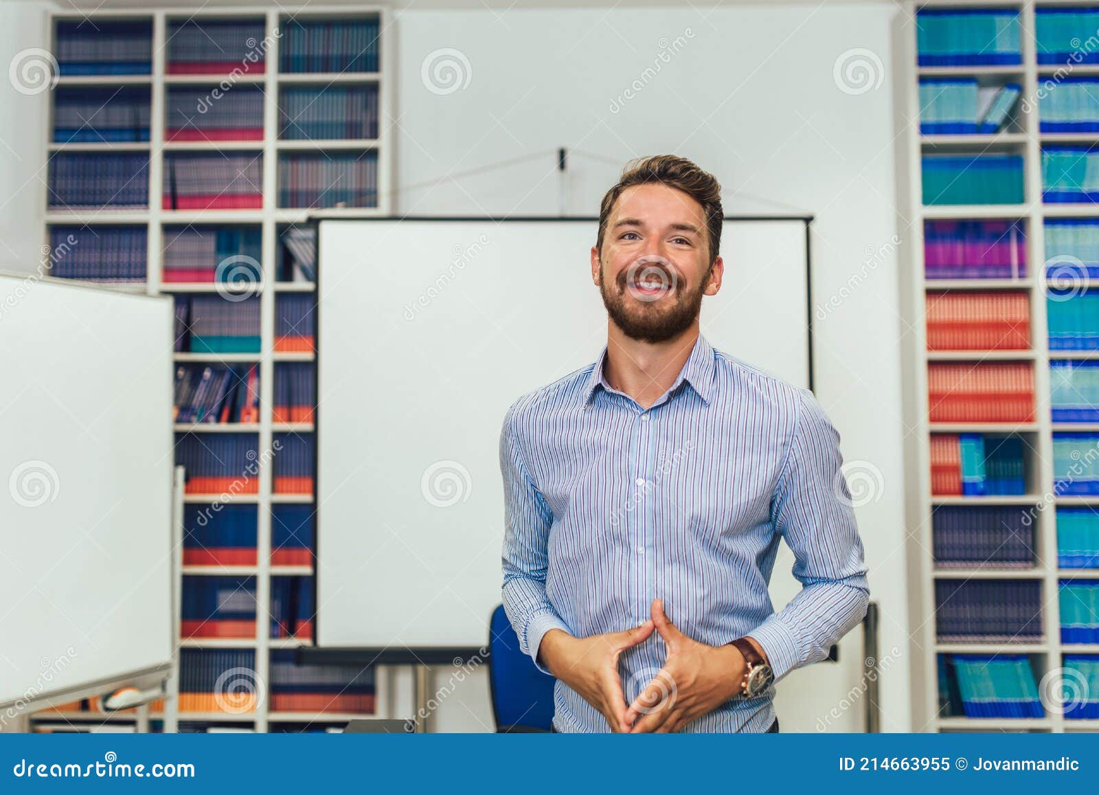 Male Coach Giving Presentation for Audience in Lecture Hall Stock Image ... Male Coach Giving Presentation for Audience in Lecture Hall Stock Image ...