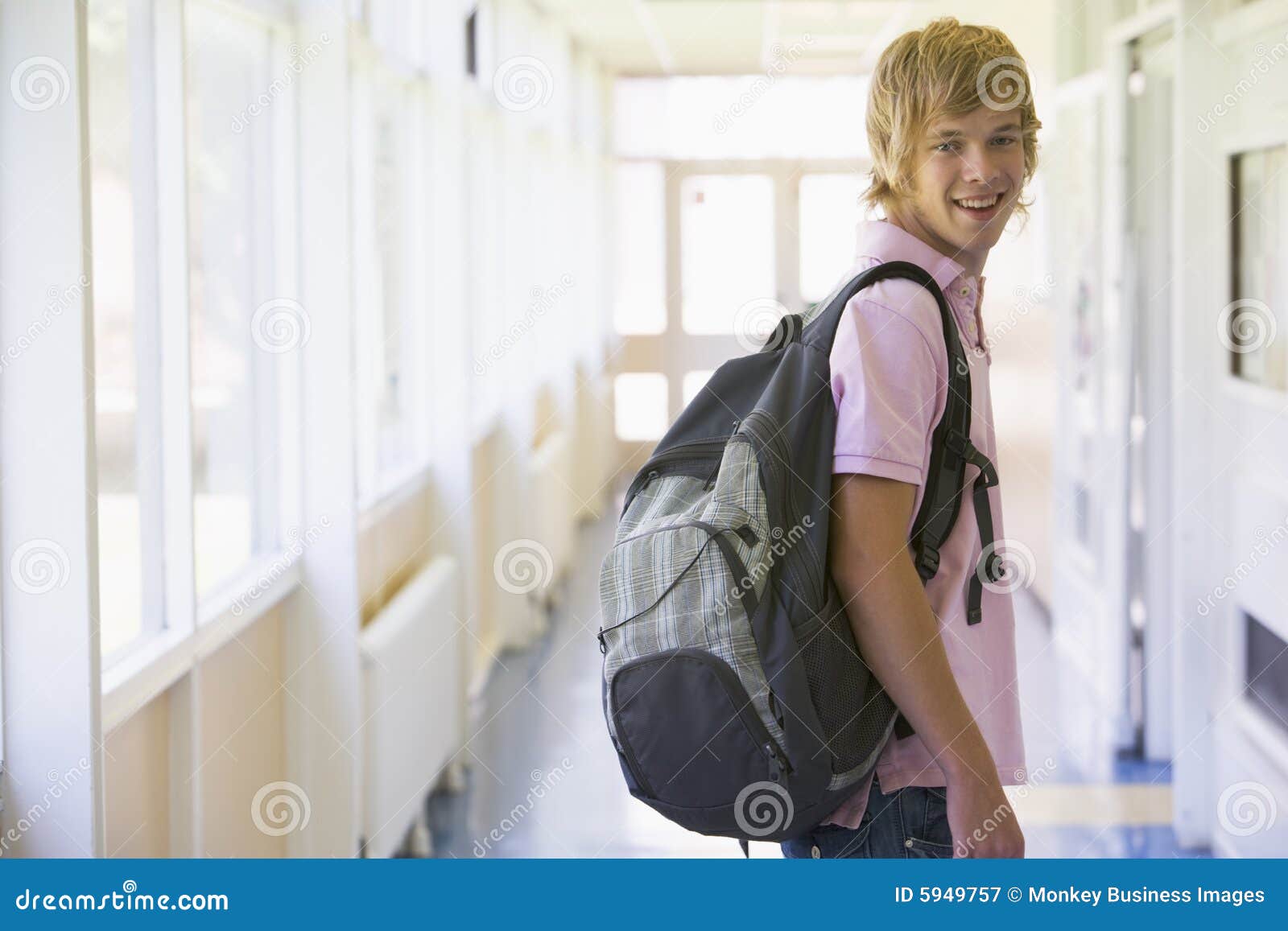 Male College Student Standing in University Stock Image - Image of ... Male College Student Standing in University Stock Image - Image of ...