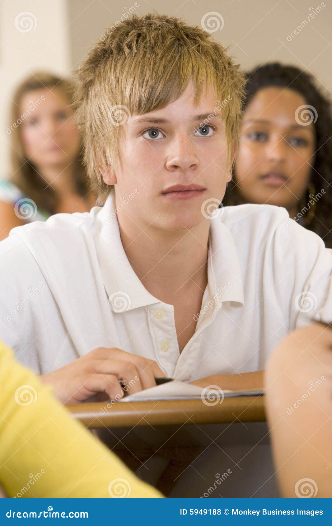 Male College Student in a University Lecture Hall Stock Photo - Image ... Male College Student in a University Lecture Hall Stock Photo - Image ...