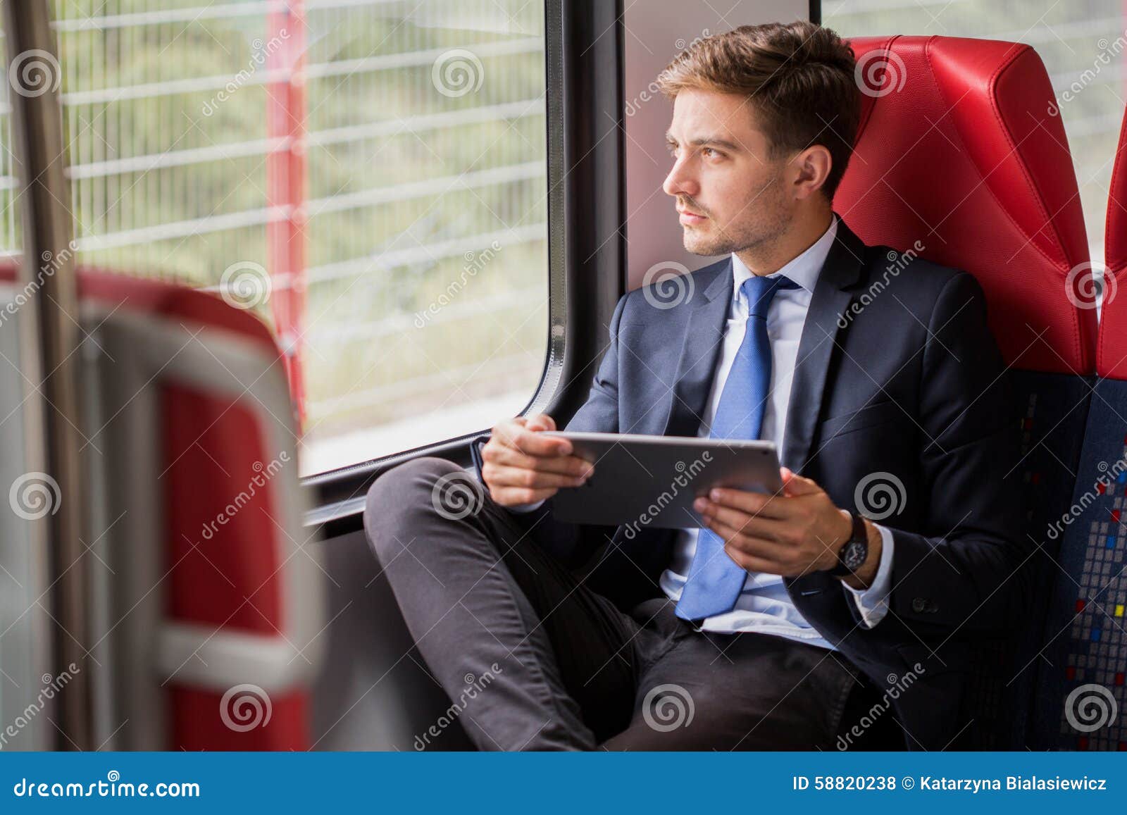 Male Commuter Traveling by Train Stock Photo - Image of train ...