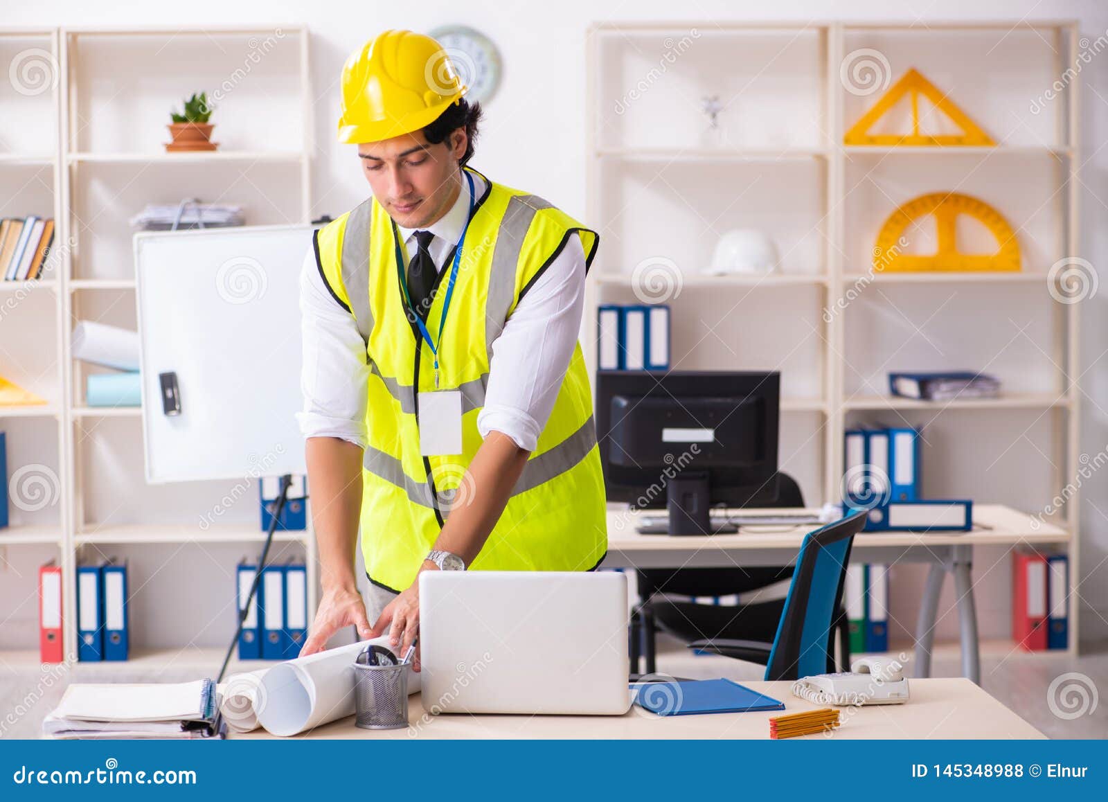 The Male Construction Engineer Working in the Office Stock Photo ...