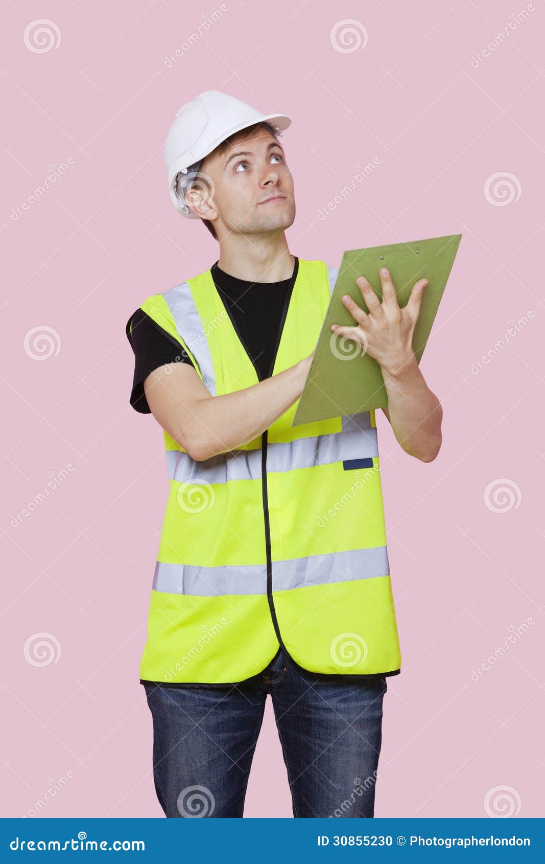 Male Construction Worker with Clipboard Looking Away Over Pink ...